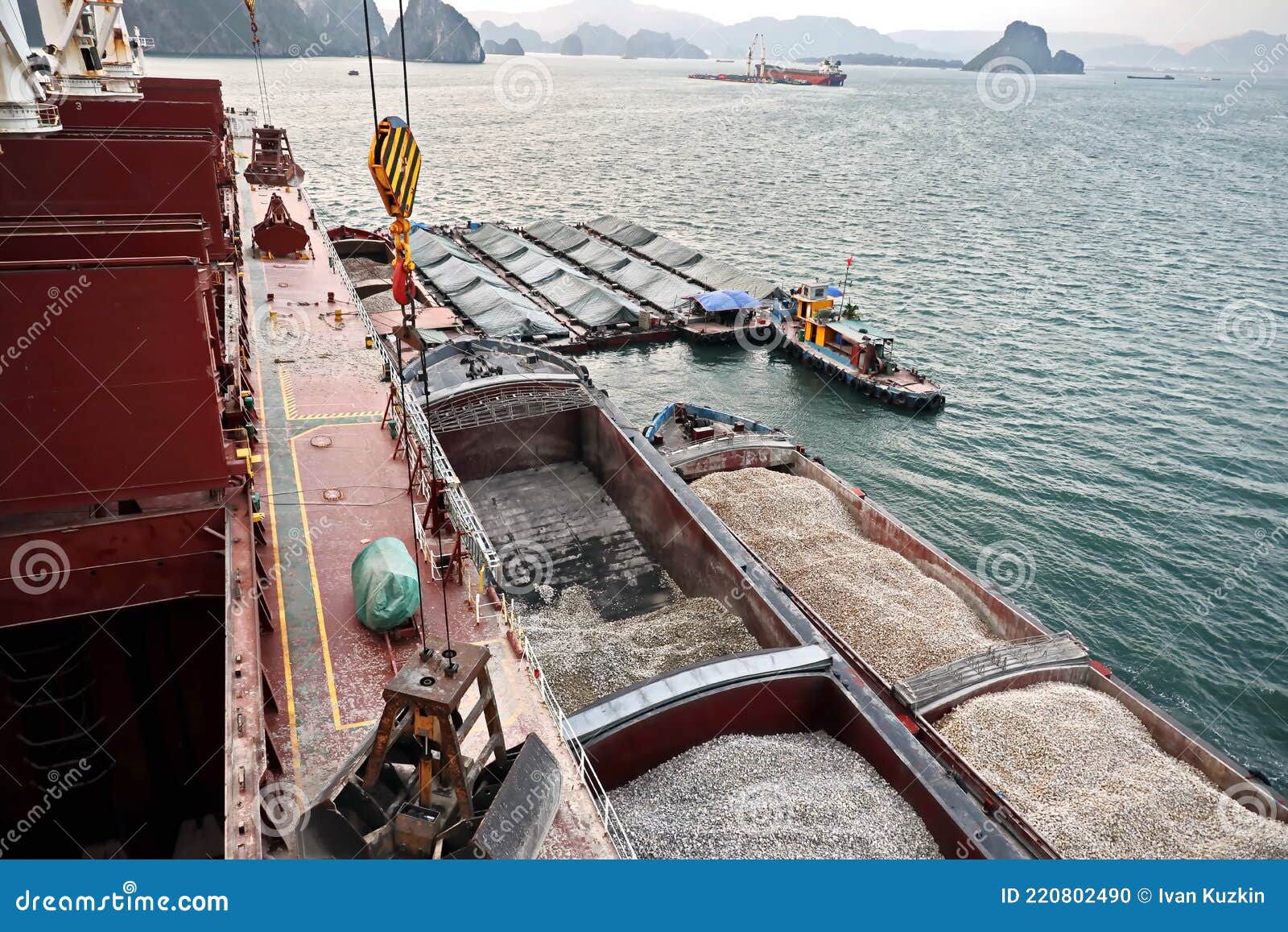 Loading Bulk Cargo of Limestone from Barges into a Bulk Carrier by ...