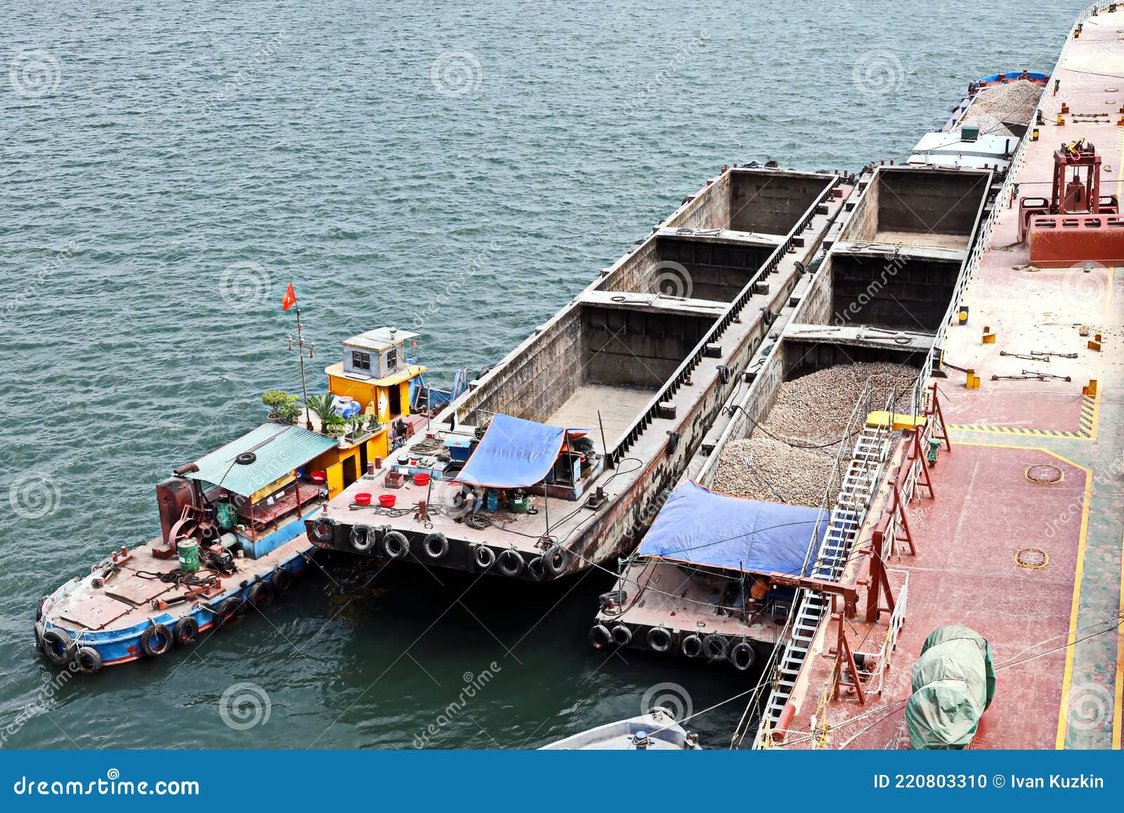 Loading Bulk Cargo of Limestone from Barges into a Bulk Carrier by ...