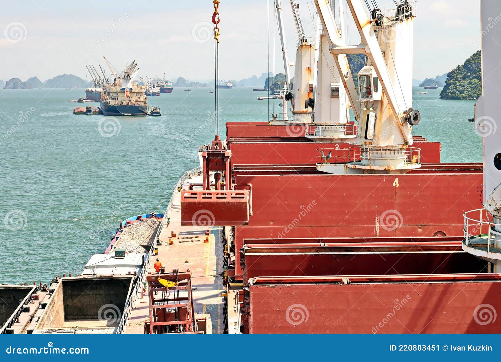 Loading Bulk Cargo of Limestone from Barges into a Bulk Carrier by ...