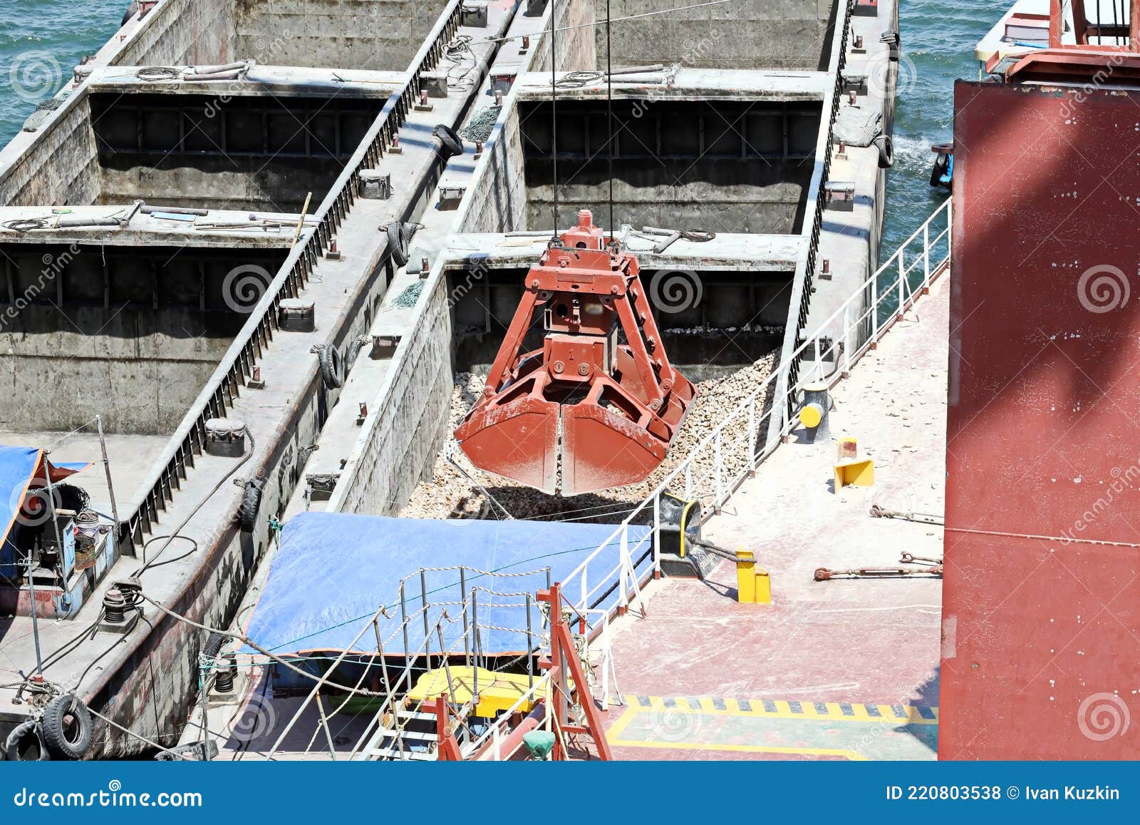 Loading Bulk Cargo of Limestone from Barges into a Bulk Carrier by ...