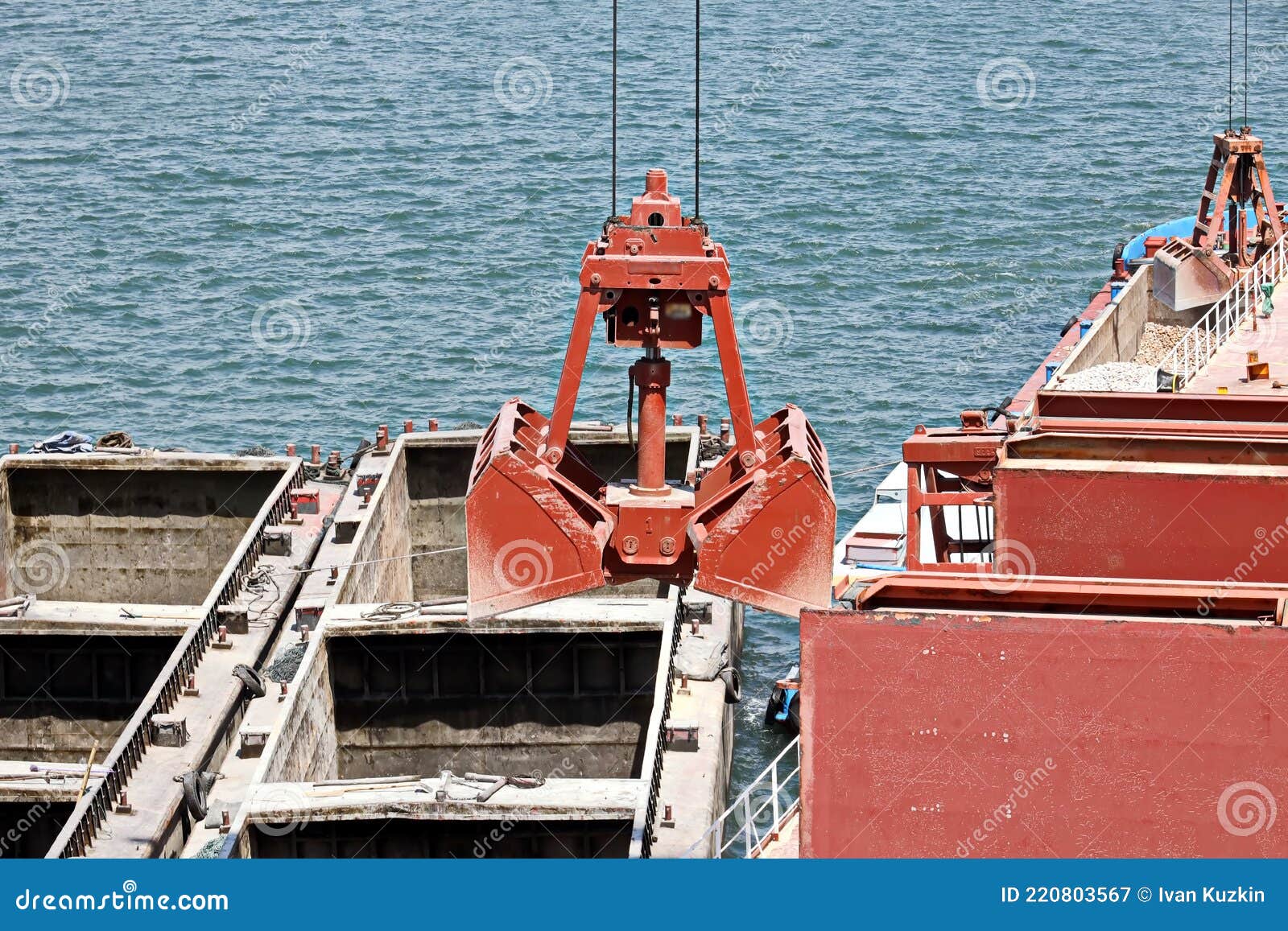 Loading Bulk Cargo of Limestone from Barges into a Bulk Carrier by ...