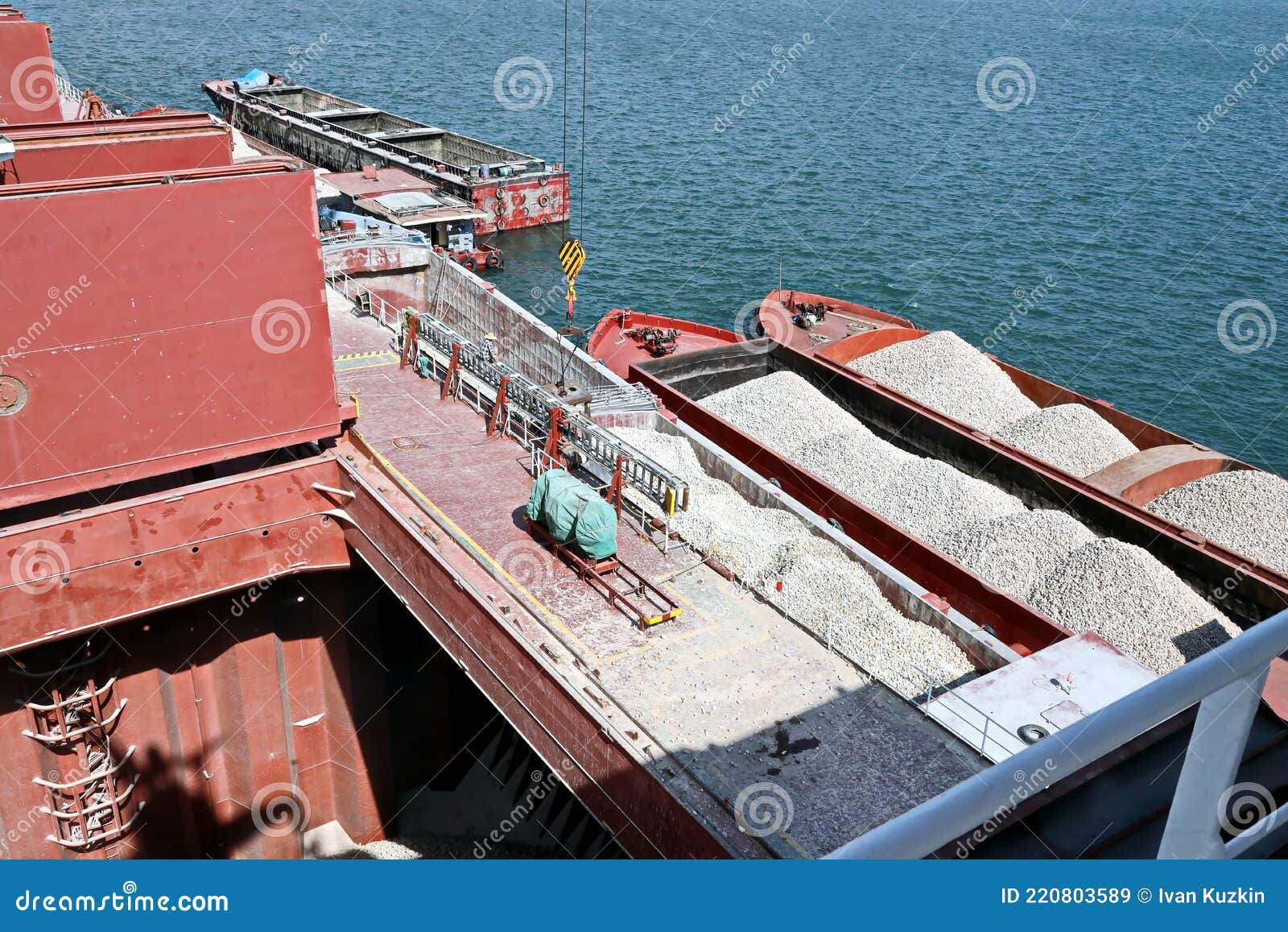 Loading Bulk Cargo of Limestone from Barges into a Bulk Carrier by ...