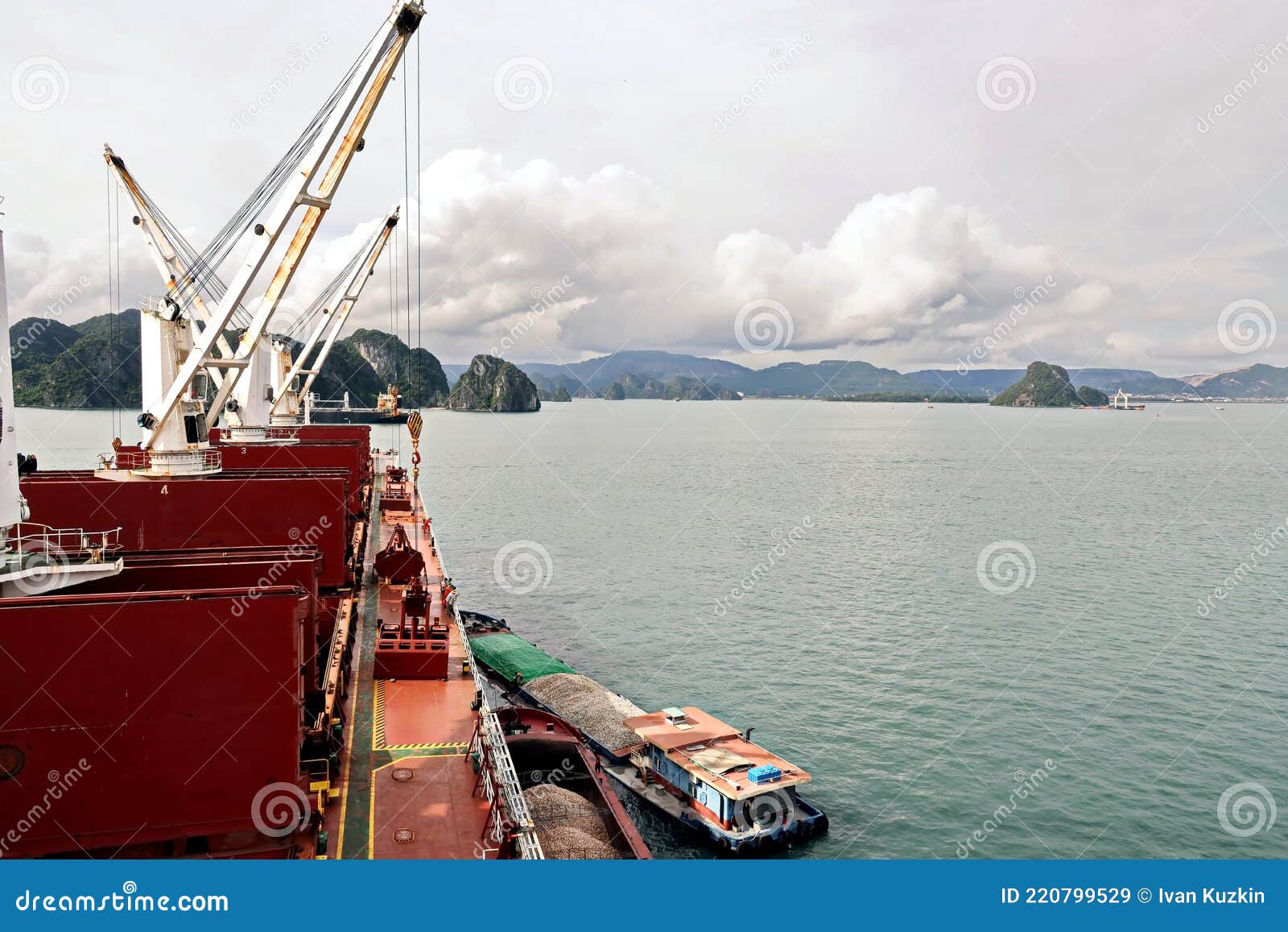 Loading Bulk Cargo of Limestone from Barges into a Bulk Carrier by ...