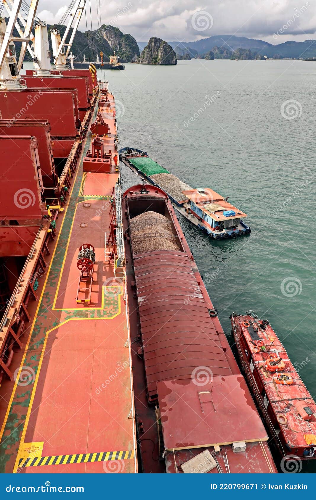 Loading Bulk Cargo of Limestone from Barges into a Bulk Carrier by ...