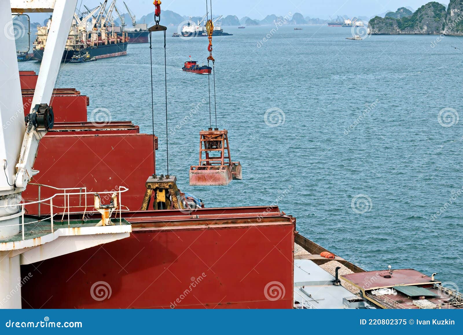 Loading Bulk Cargo of Limestone from Barges into a Bulk Carrier by ...
