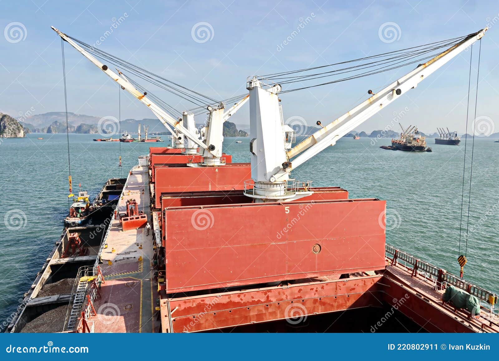 Loading Bulk Cargo of Limestone from Barges into a Bulk Carrier by ...