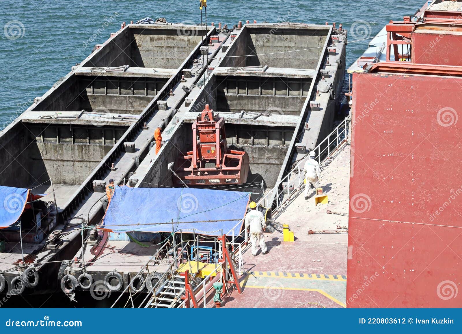Loading Bulk Cargo of Limestone from Barges into a Bulk Carrier by ...