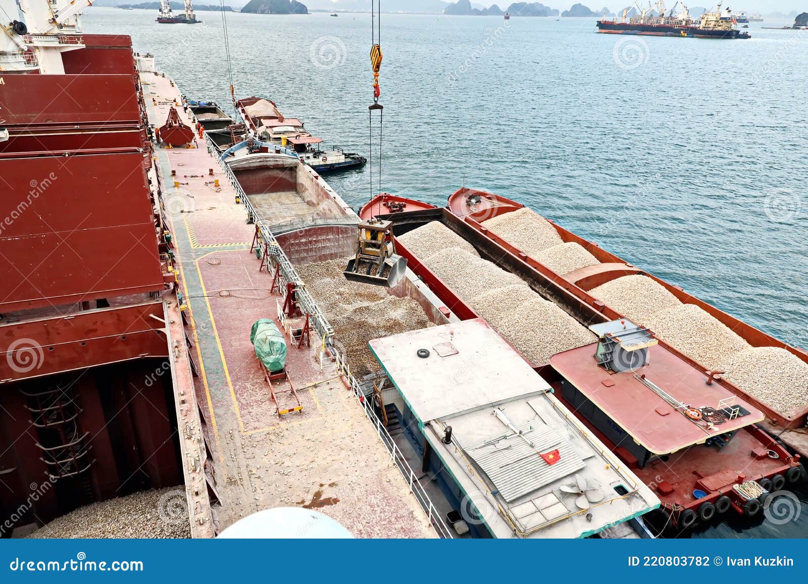 Loading Bulk Cargo of Limestone from Barges into a Bulk Carrier by ...
