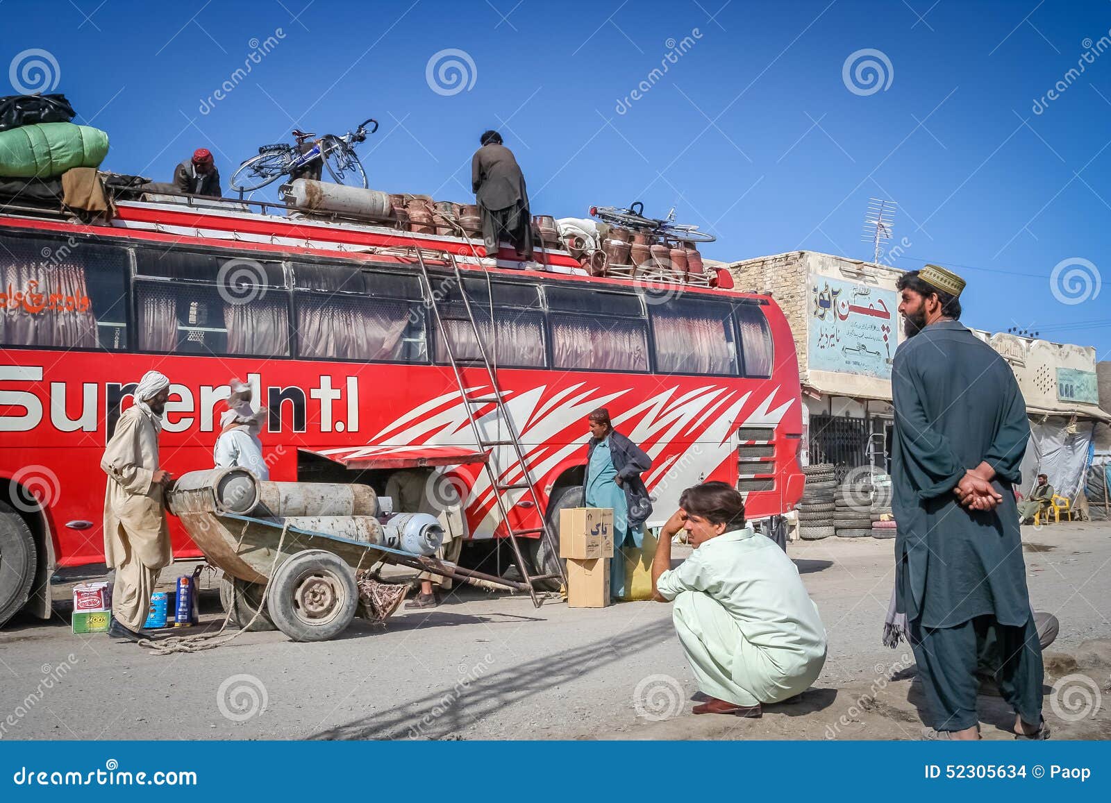 Loading the bus editorial stock image. Image of driving - 52305634