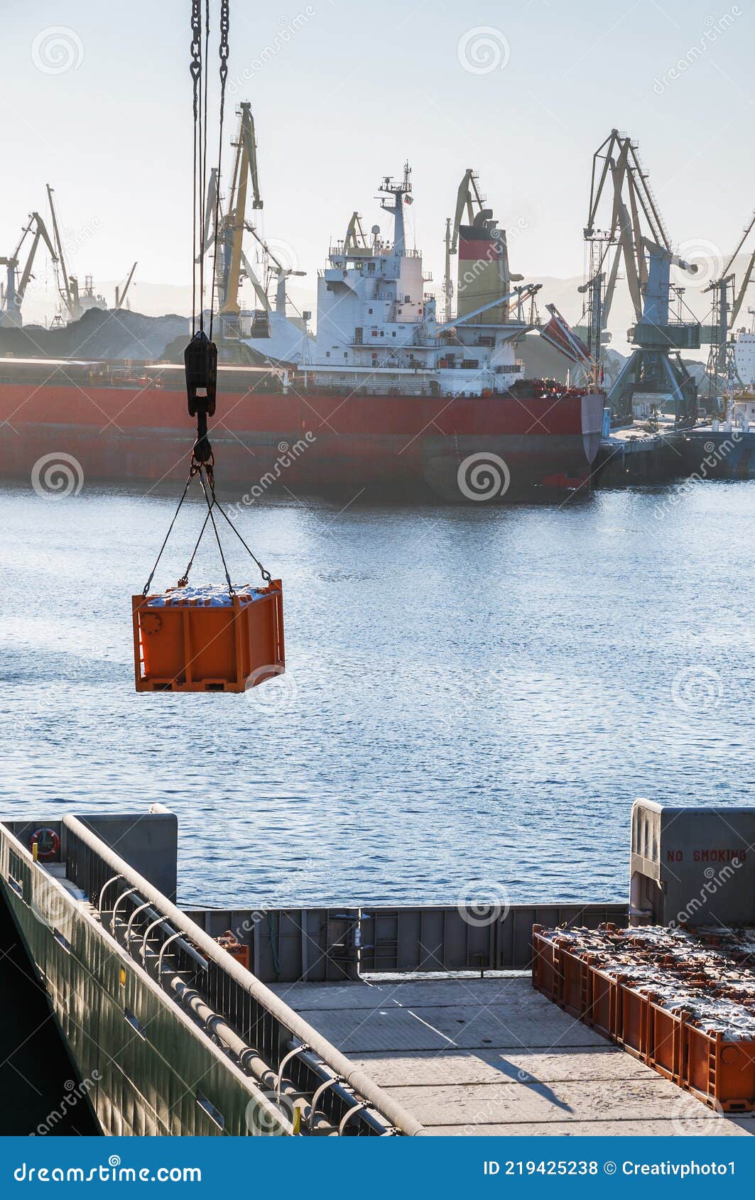 Loading Cargo on Board Vessel at the Port Stock Photo - Image of cargo ...