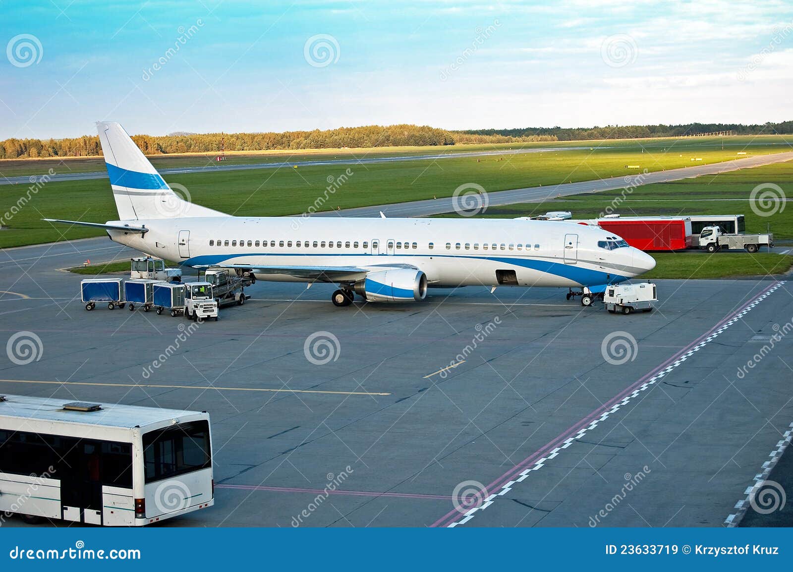 Loading cargo on a plane stock image. Image of runway - 23633719