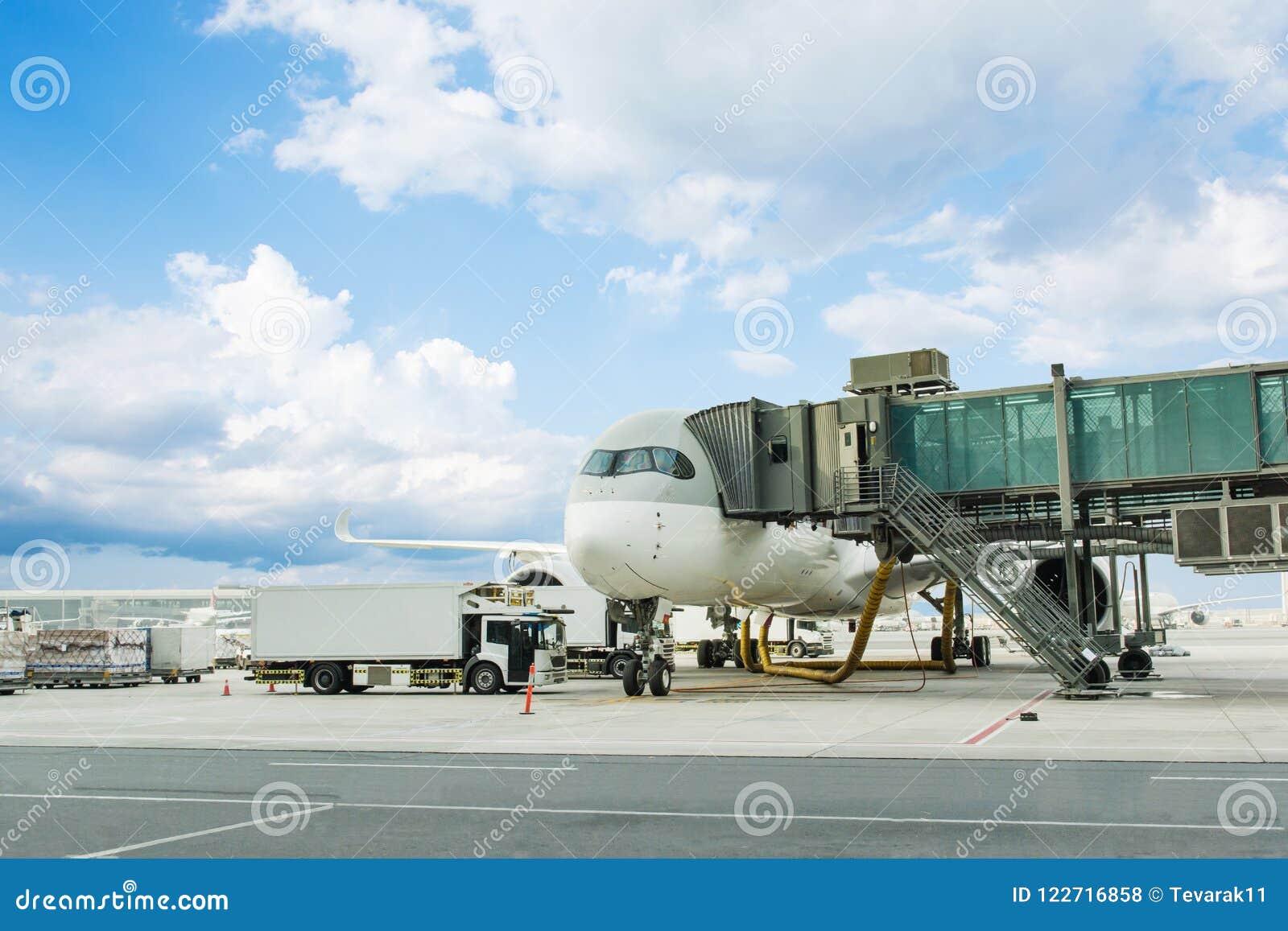 Loading Cargo on Plane in Airport. Cargo Plane Loading for Logistic and ...