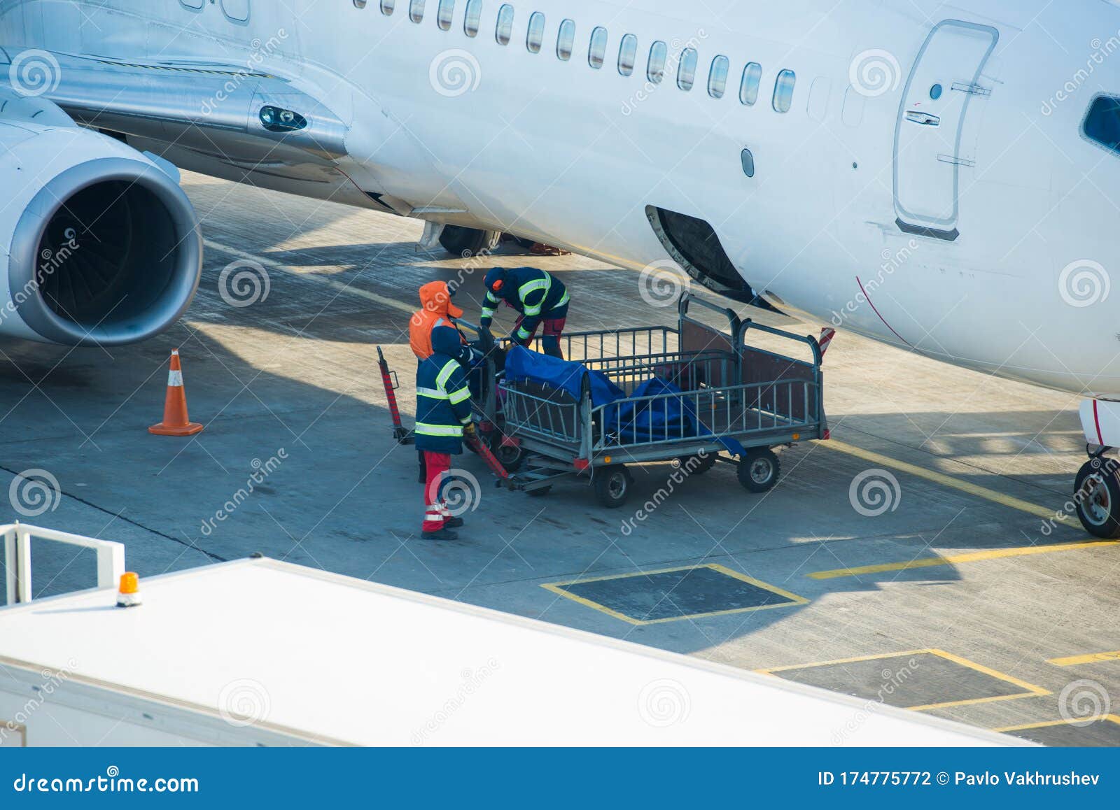 Loading Cargo into Plane before Flight Stock Photo - Image of ...