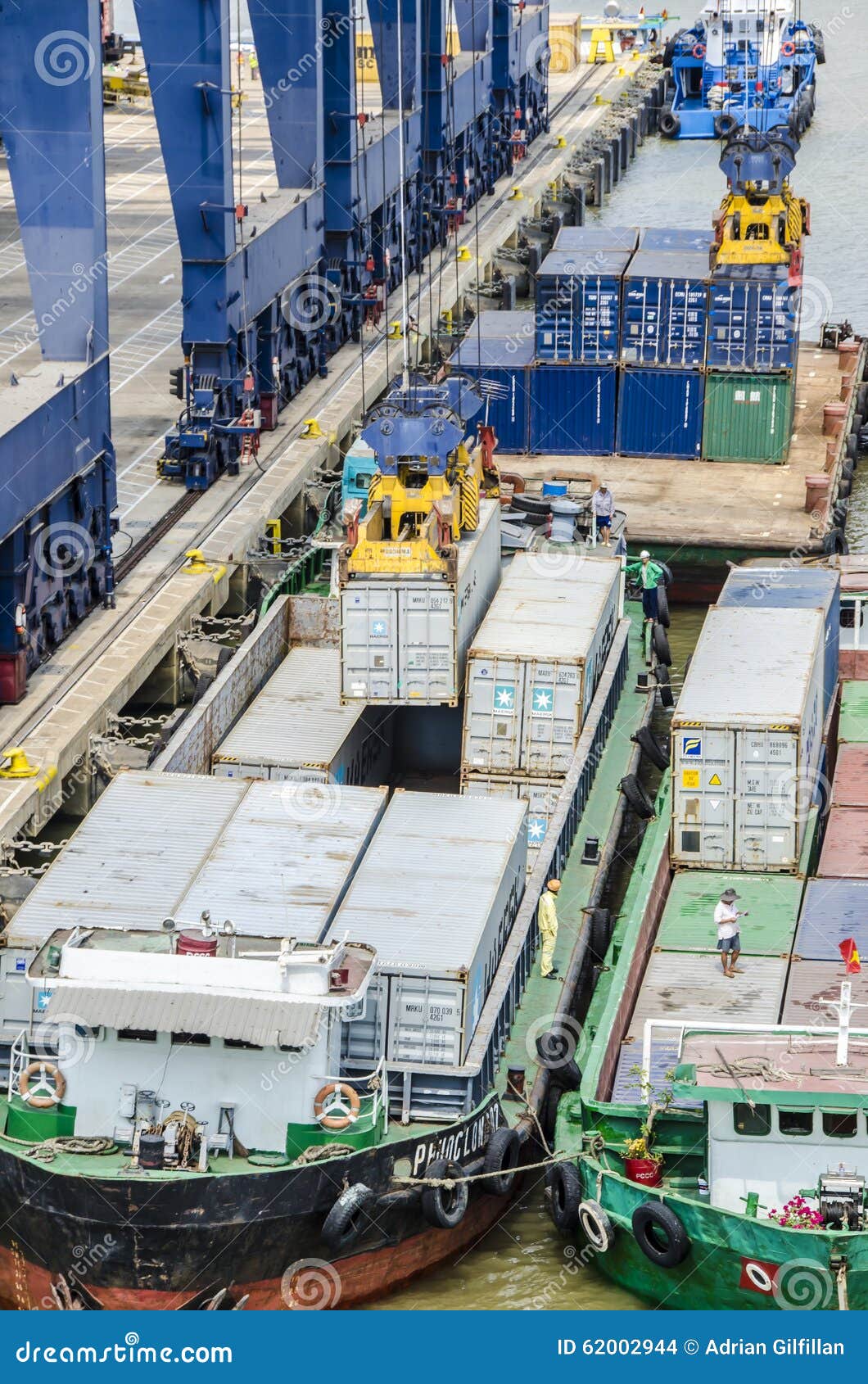 Loading cargo on ship editorial stock image. Image of vietnam - 62002944