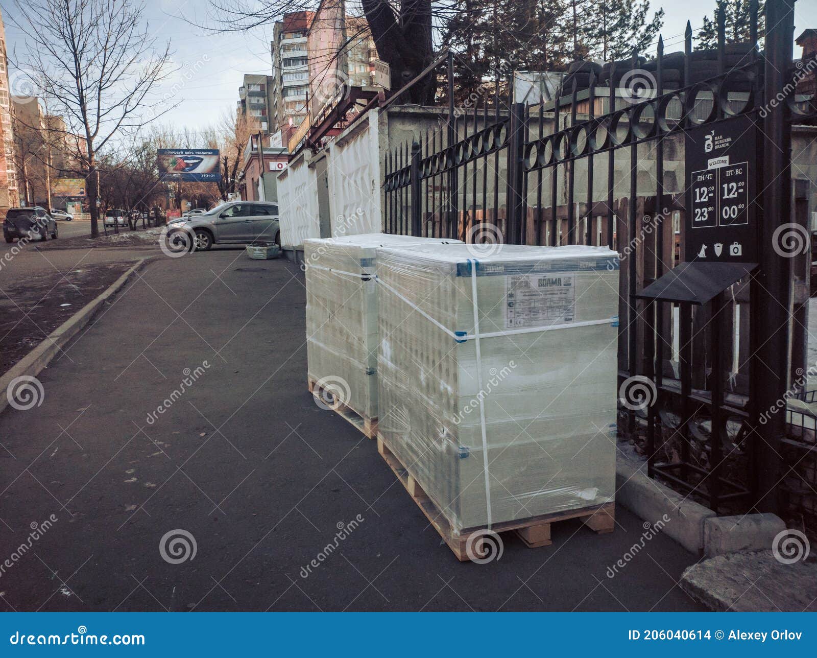 Loading Cargo from the Street into a Building in Winter. Editorial ...