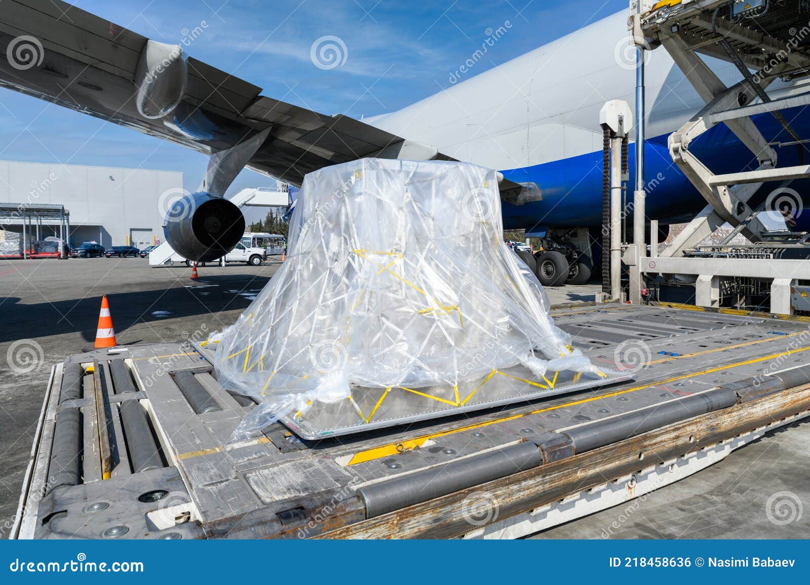 Loading of Cargo To the Aircraft Stock Photo - Image of shipment ...