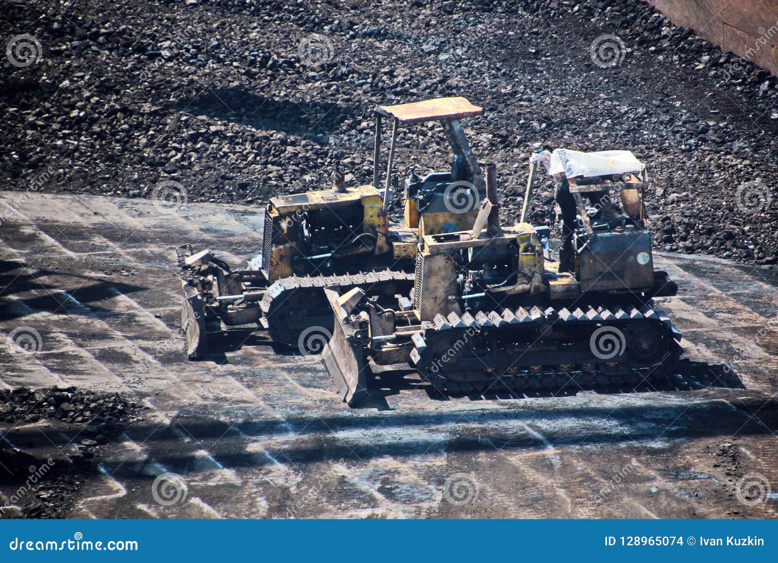 Loading Coal from Cargo Barges Onto a Bulk Carrier Using Ship Cranes ...