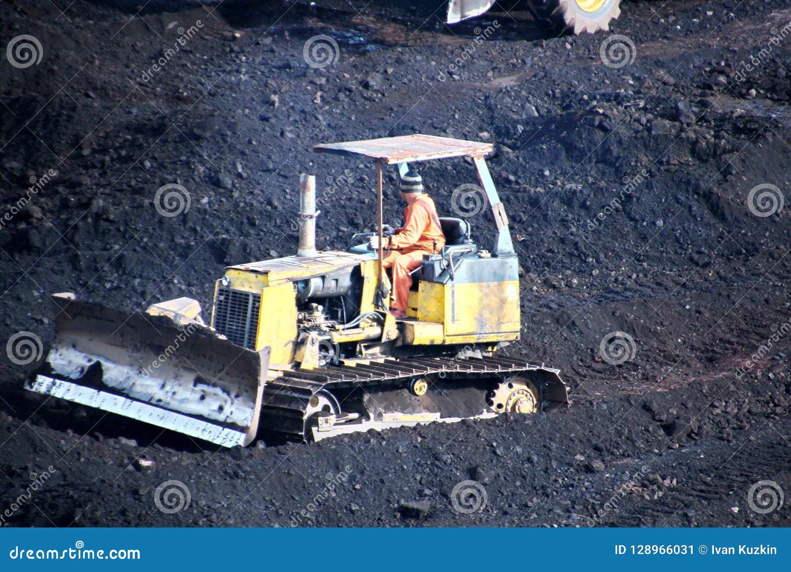 Loading Coal from Cargo Barges Onto a Bulk Carrier Using Ship Cranes ...