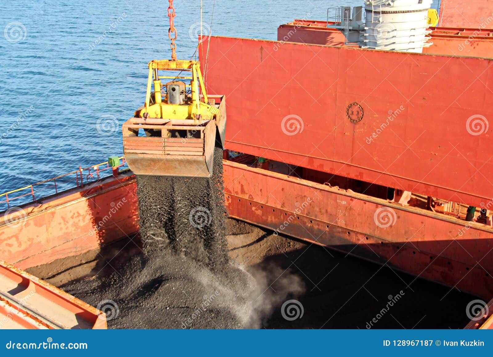 Loading Coal From Cargo Barges Onto A Bulk Carrier Using Ship Cranes ...
