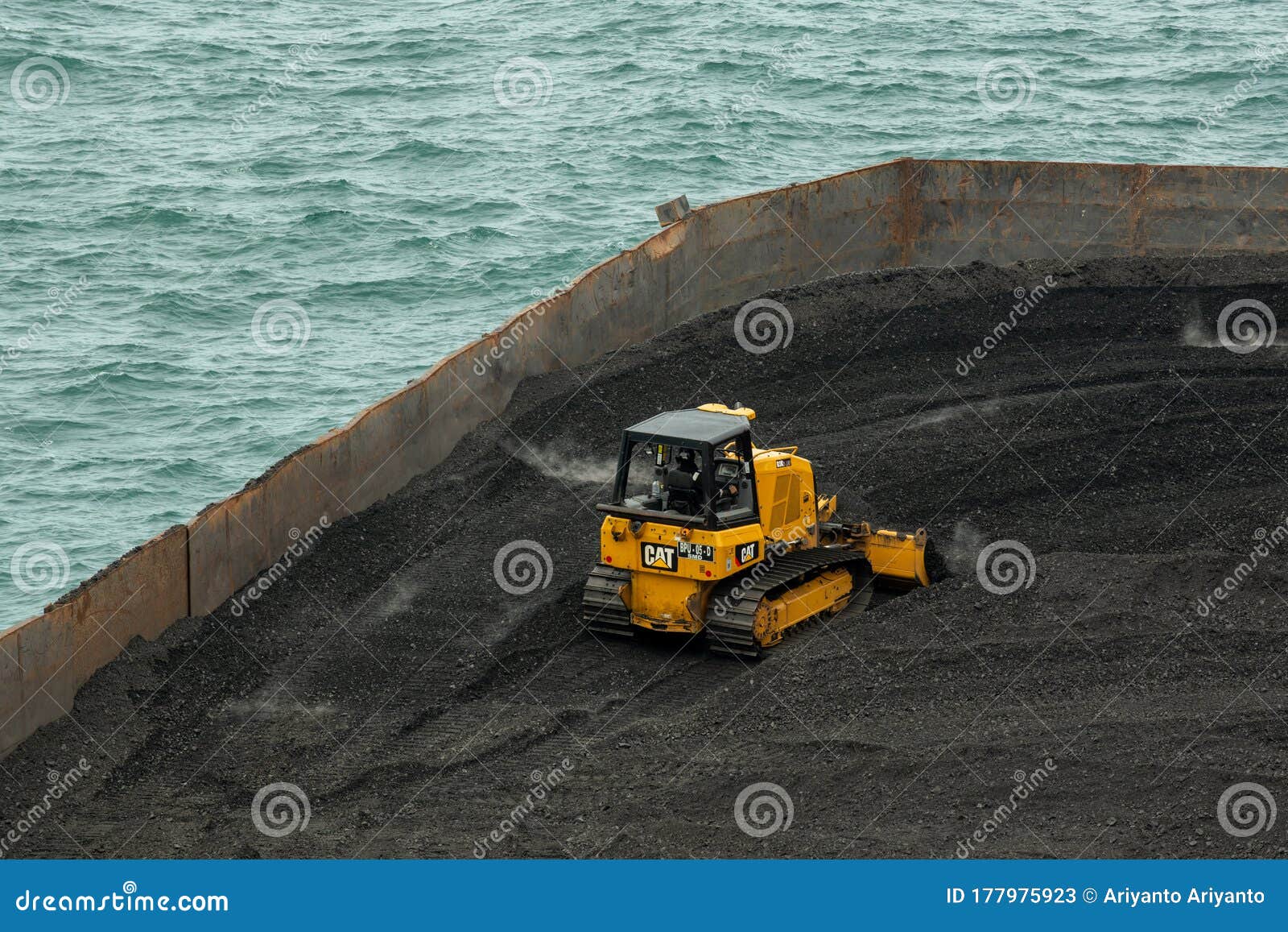 Loading Coal from Cargo Barges Onto a Bulk Vessel Using Ship Cranes ... Loading Coal from Cargo Barges Onto a Bulk Vessel Using Ship Cranes ...