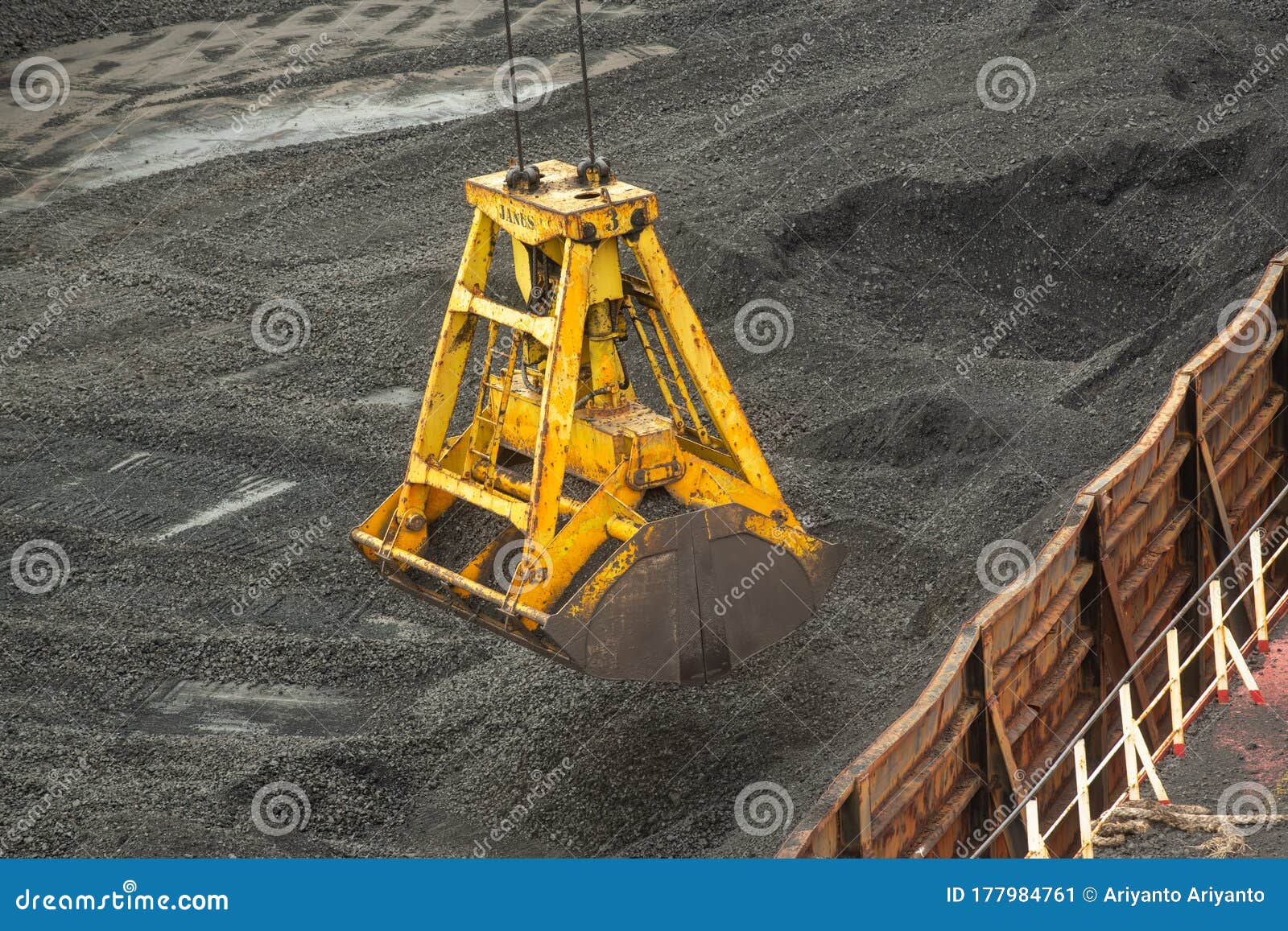 Loading Coal from Cargo Barges Onto a Bulk Vessel Using Ship Cranes in ...