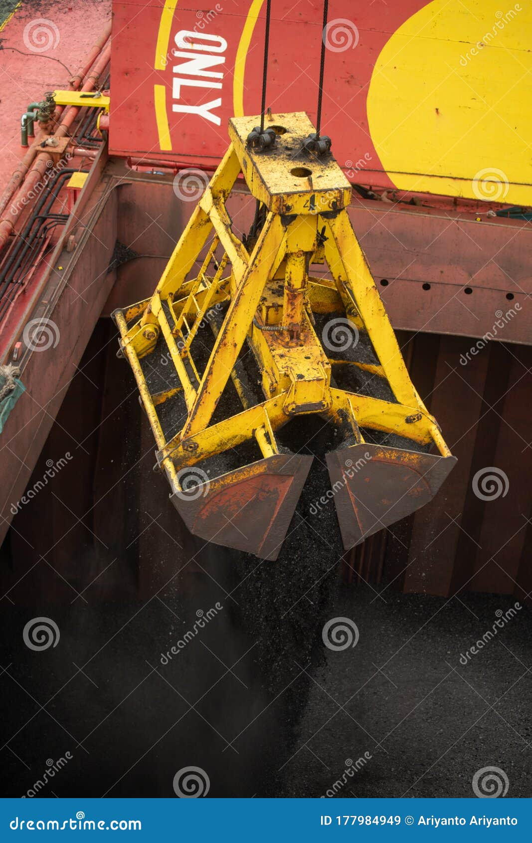 Loading Coal from Cargo Barges Onto a Bulk Vessel Using Ship Cranes in ...