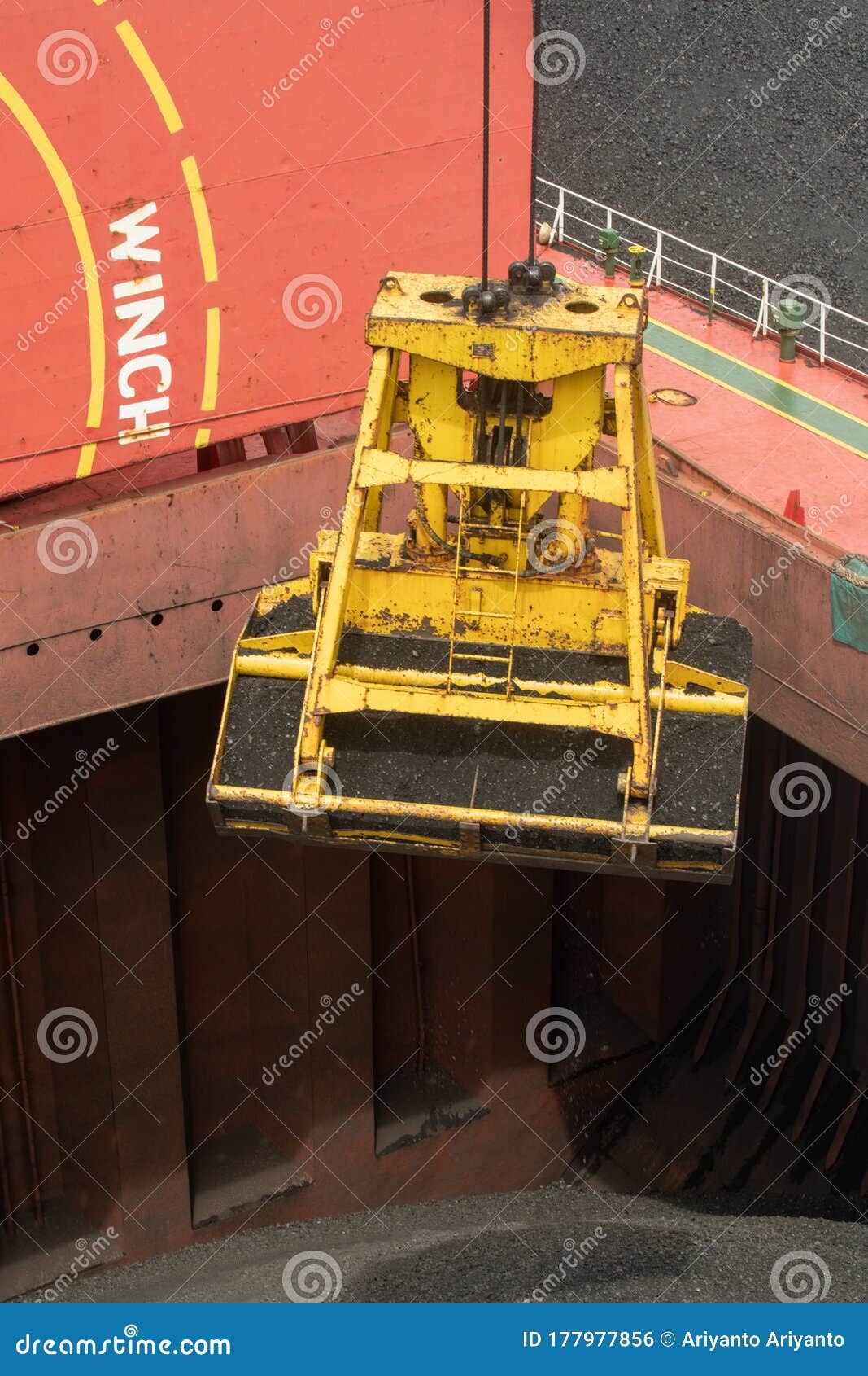 Loading Coal from Cargo Barges Onto a Bulk Vessel Using Ship Cranes in ...
