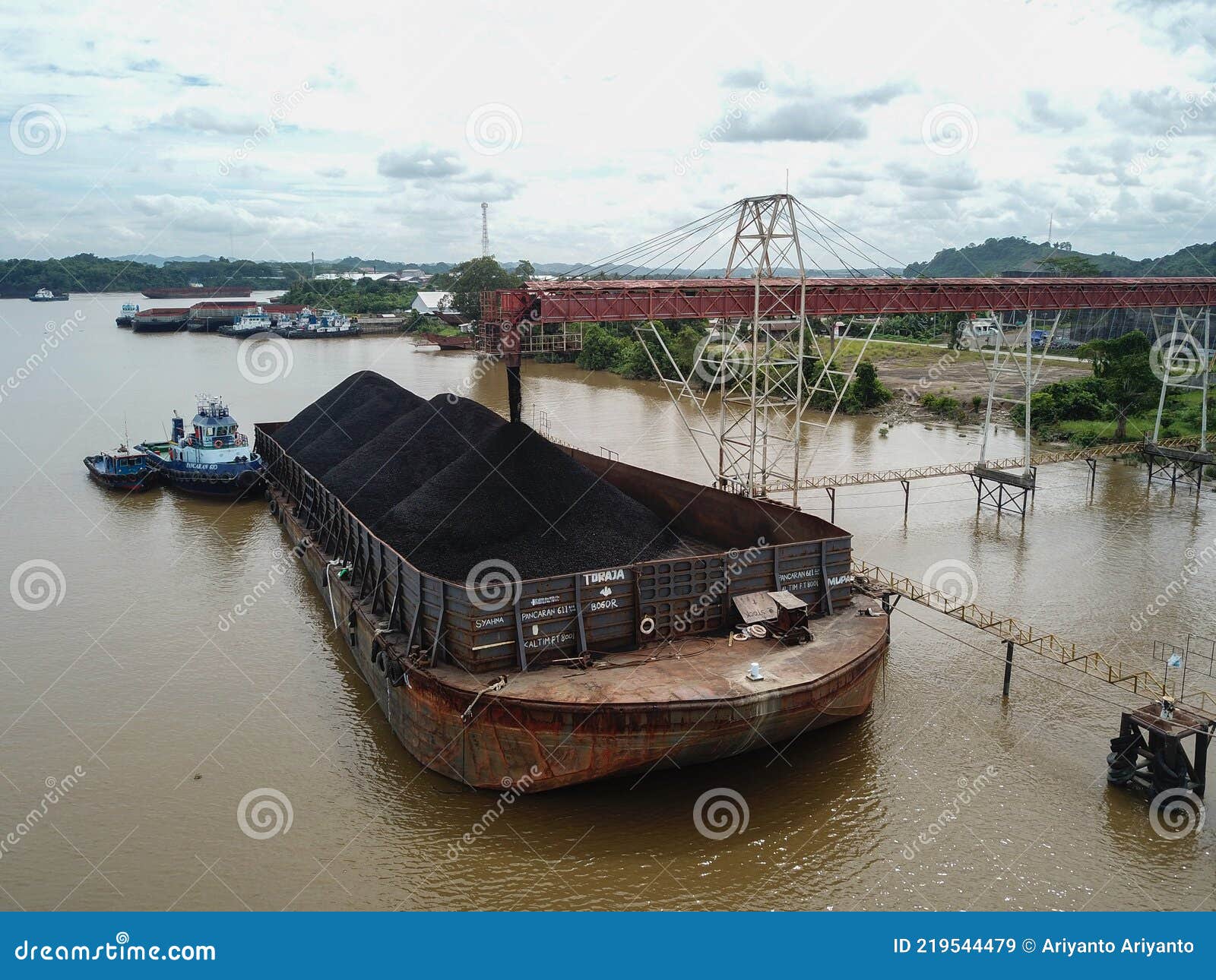 Loading Coal Onto the Barge from the Stock Pile, Aerial View Editorial ...