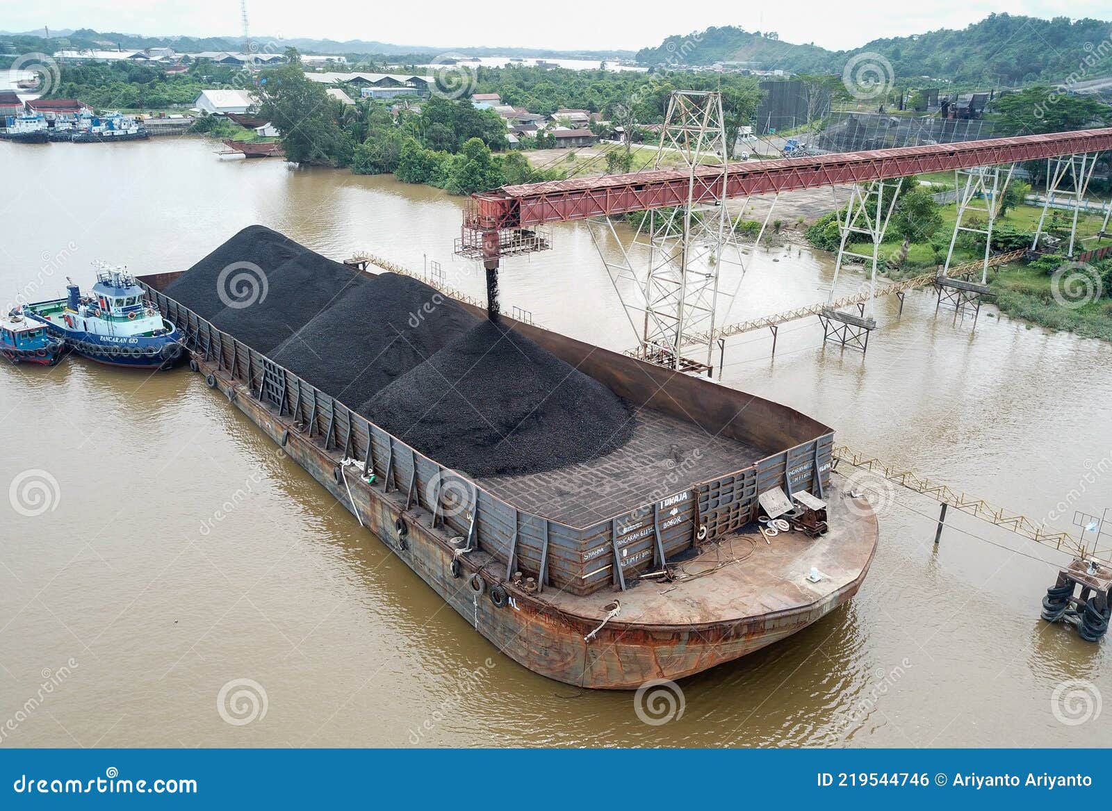 Loading Coal Onto the Barge from the Stock Pile, Aerial View Editorial ...