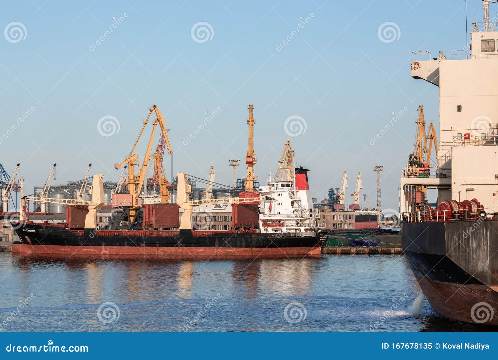 Loading Containers on a Container Ships, Port Cranes and Huge Ships ...