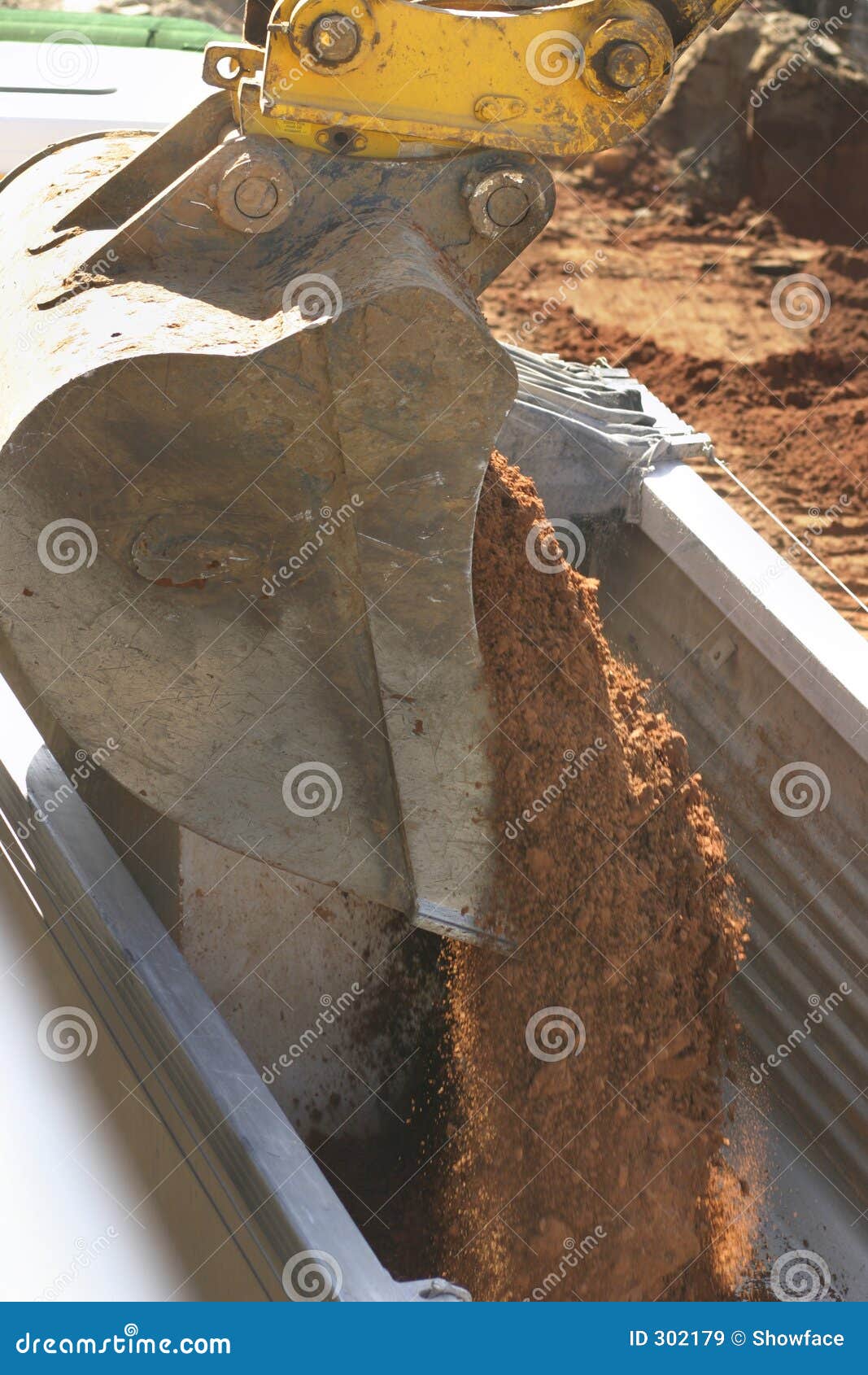 Loading Dirt - close stock image. Image of machinery, equipment - 302179
