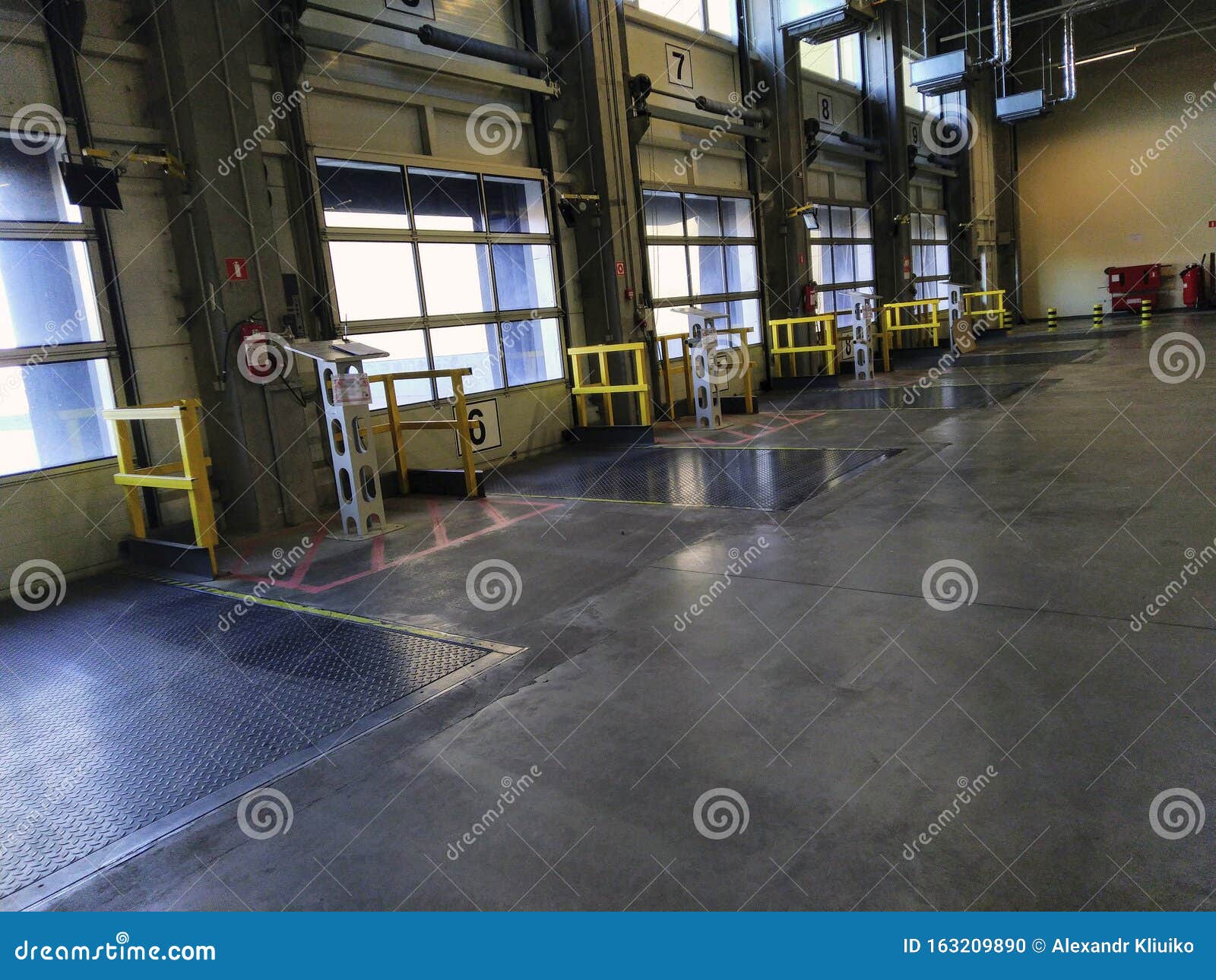 Loading Docks for Trucks in Warehouse, Angle View Stock Photo - Image ...