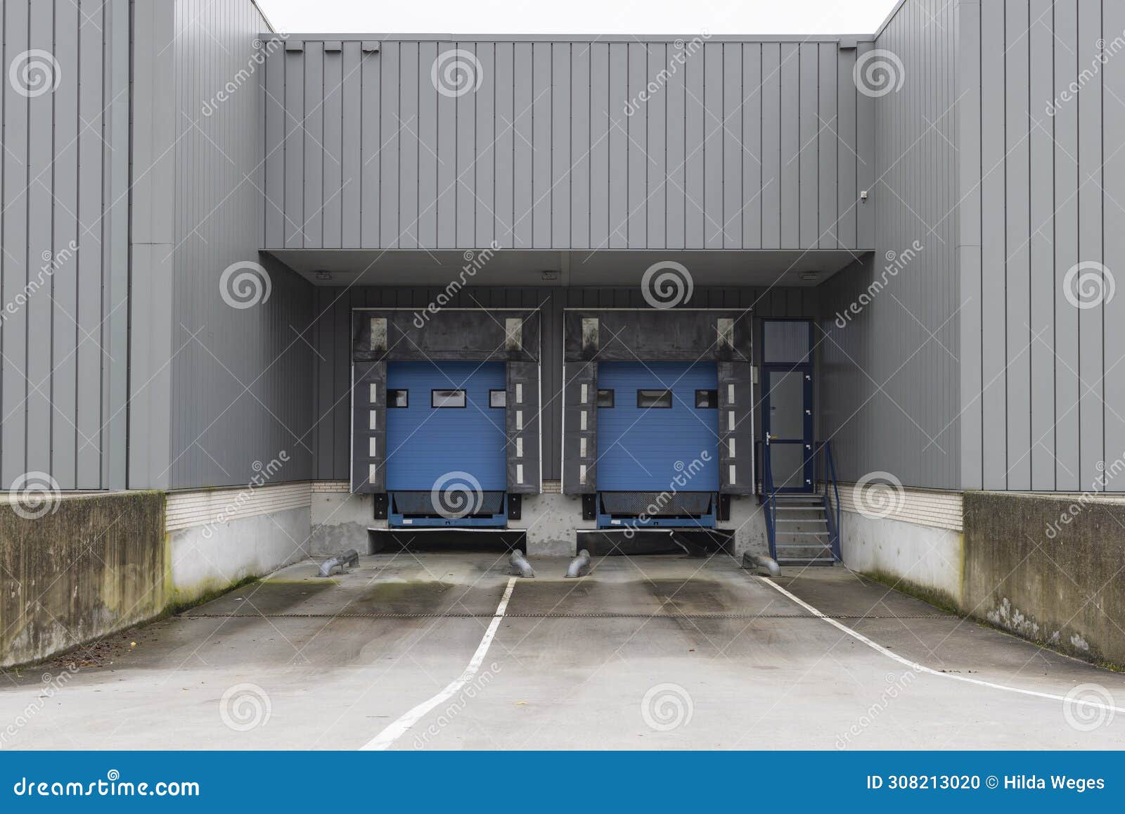 Loading docks of warehouse stock photo. Image of package - 308213020