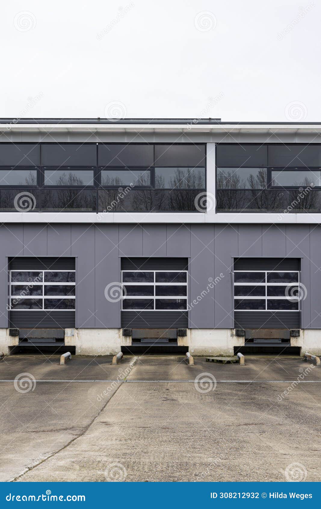 Loading docks of warehouse stock photo. Image of factory - 308212932