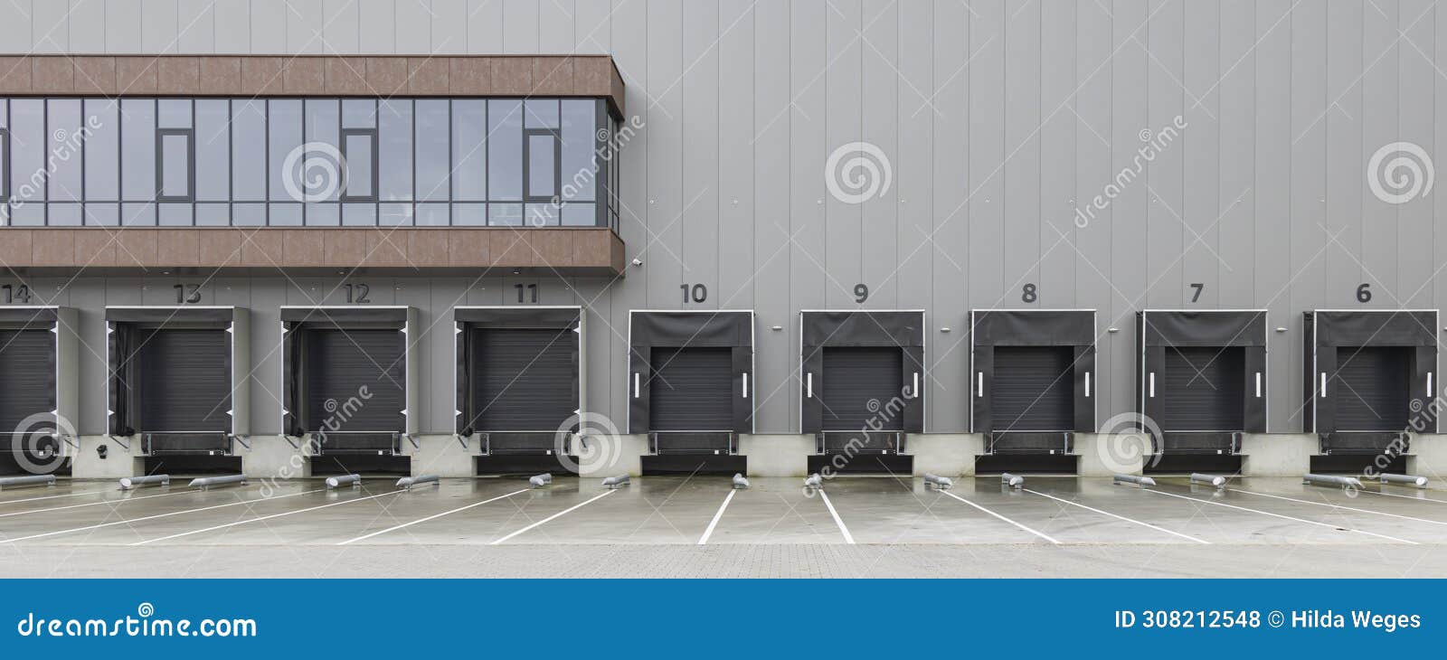 Loading docks of warehouse stock photo. Image of commercial - 308212548