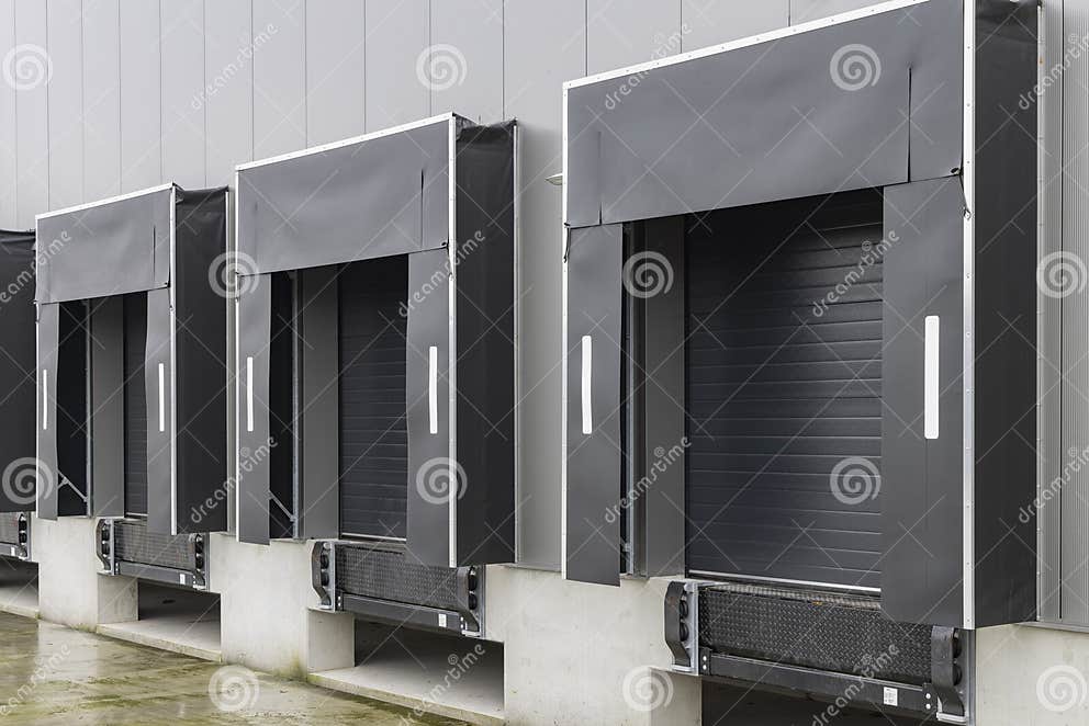 Loading docks of warehouse stock photo. Image of shipping - 308212630