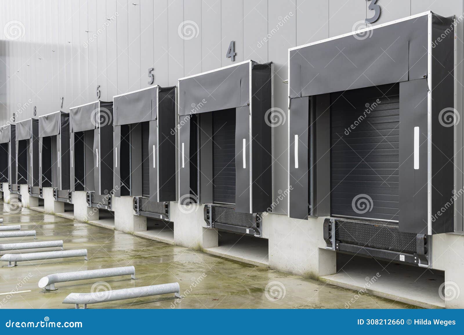 Loading docks of warehouse stock photo. Image of import - 308212660