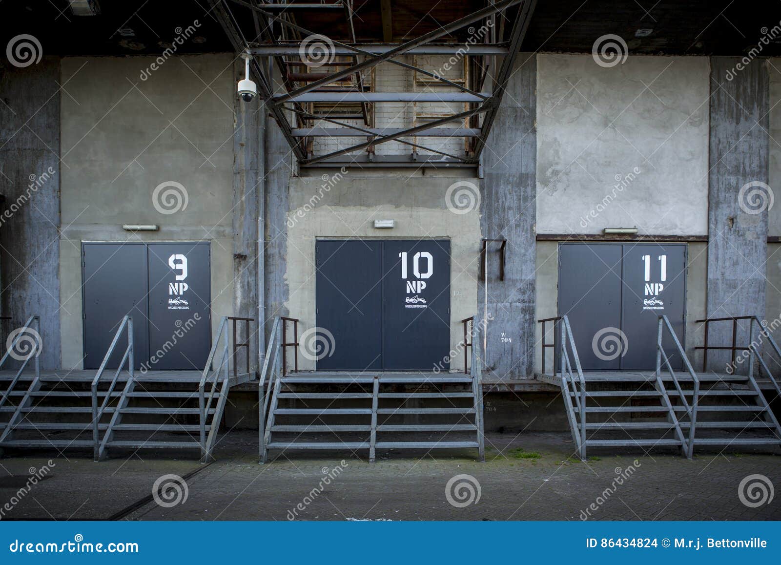 Loading Doors in Abandoned Factory Stock Photo - Image of room, door ...