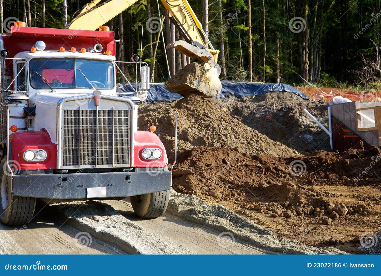 Loading a dump truck stock photo. Image of loader, land - 23022186