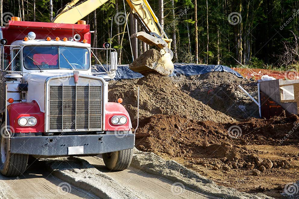 Loading a dump truck stock photo. Image of loader, land - 23022186