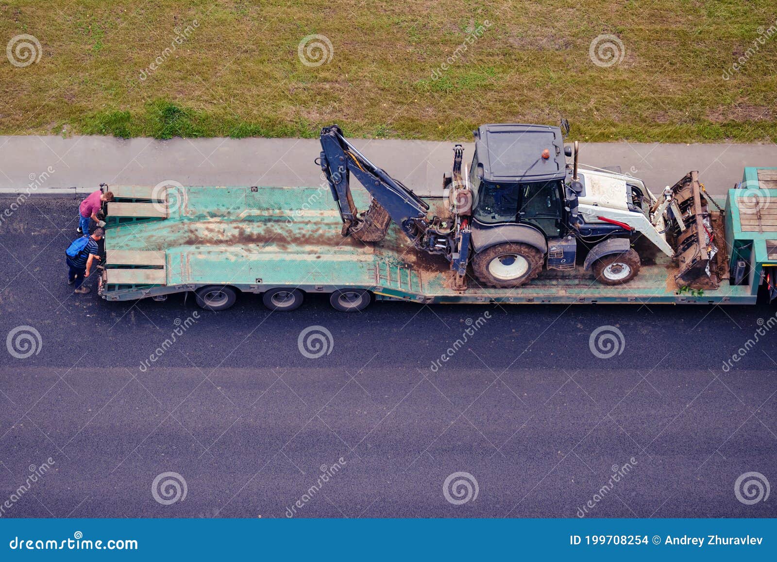 Loading the Excavator Onto the Platform of a Construction Equipment ...