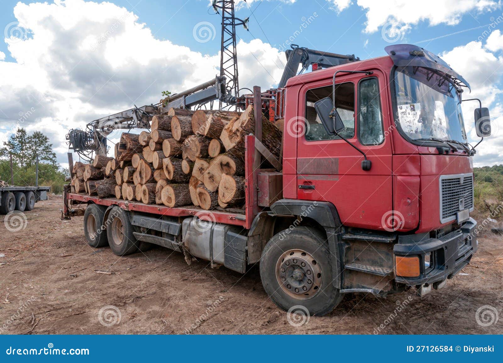 Loading of Felled Timber in a Truck with Crane Stock Photo - Image of ...