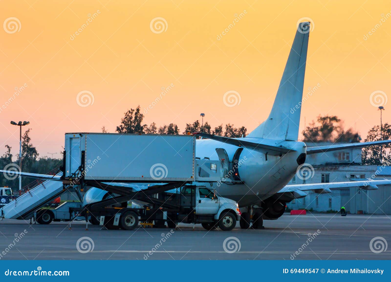 Loading food on a plane stock image. Image of luggage - 69449547