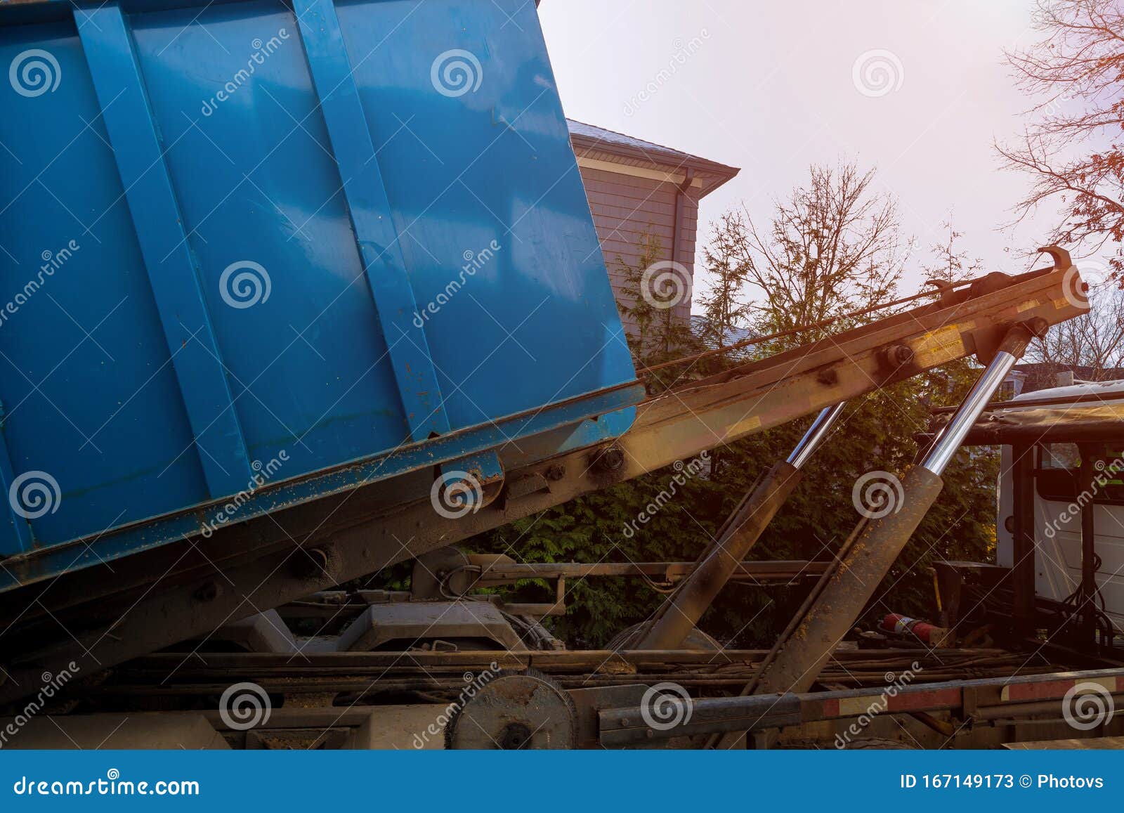 Loading the Garbage Container Old and Used Construction Material in the ...