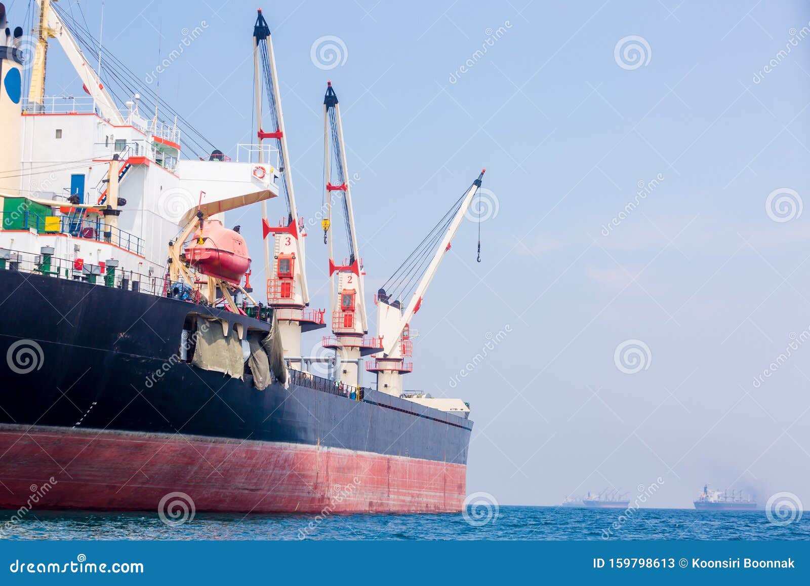 Loading Goods on Cargo Ship with Crane. Shipment from a Merchant To a ...