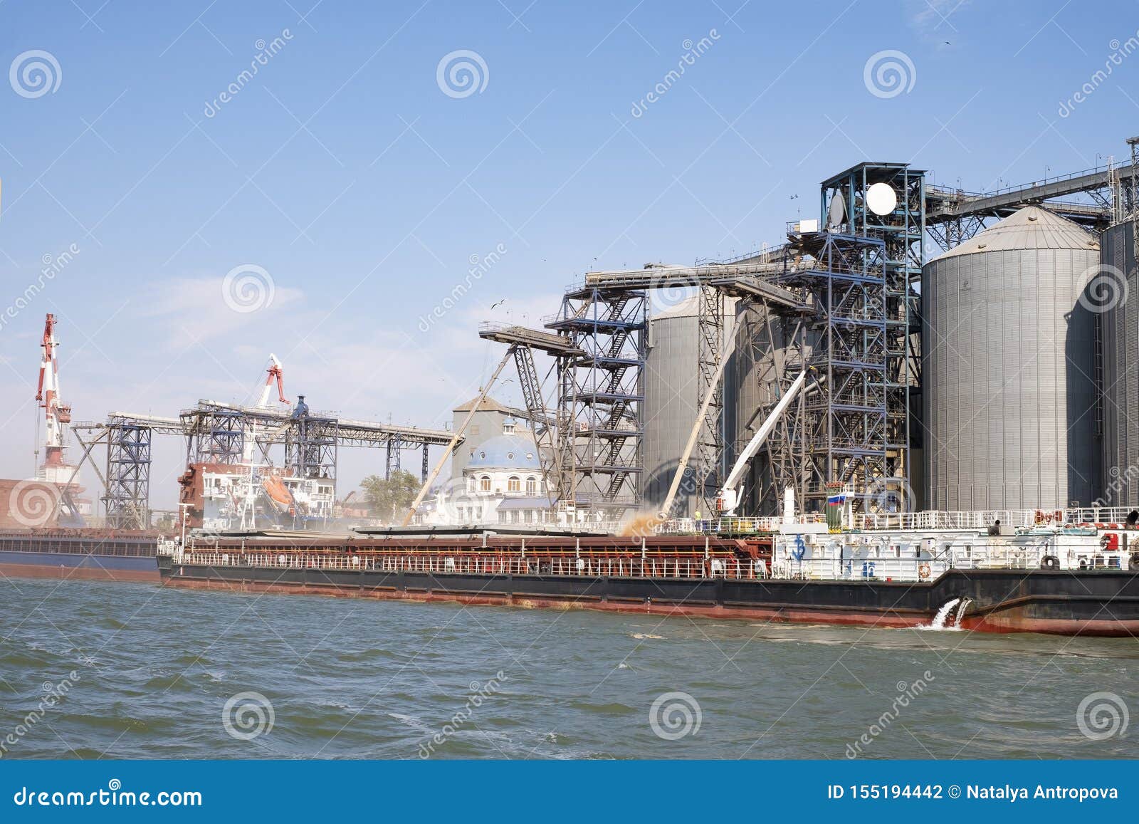 Loading Grain on a Ship in the Port. View from the River To the Port ...