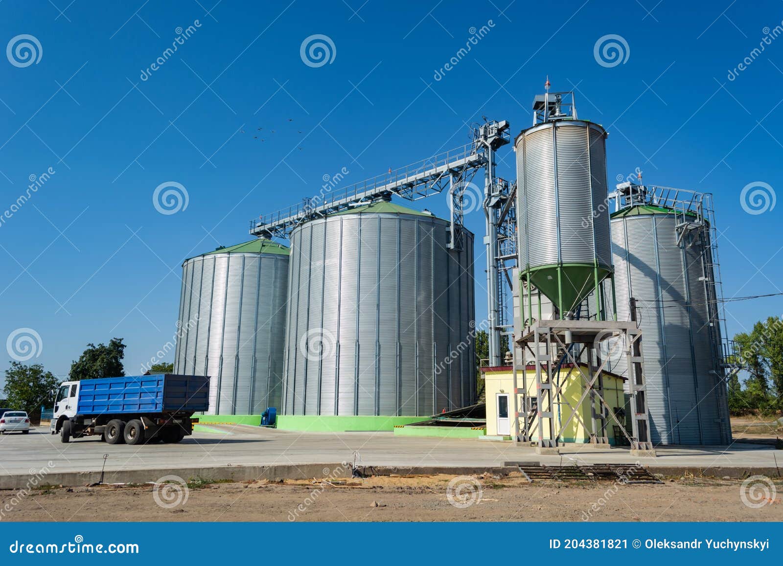 Loading Grain by Trucks Onto the Elevator into Metal Containers Stock ...