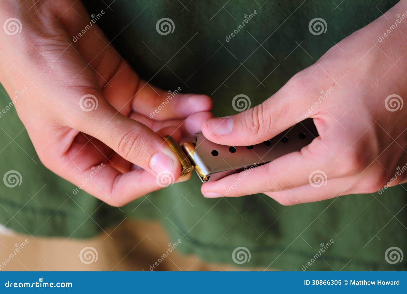Loading a Gun stock image. Image of dangerous, protection - 30866305