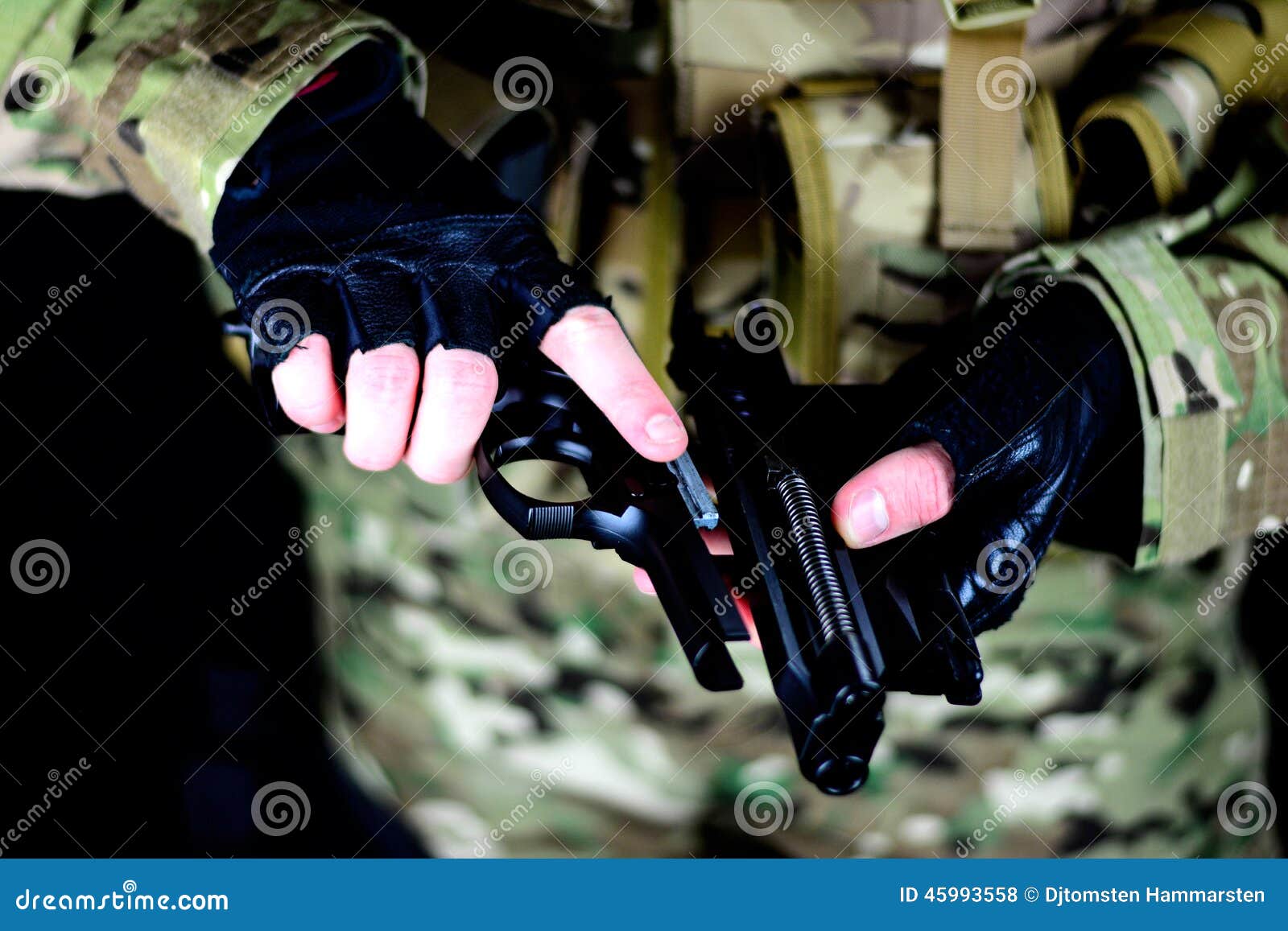Loading a gun stock photo. Image of protection, loading - 45993558