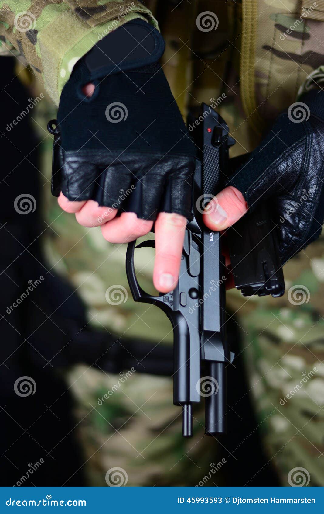 Loading a gun stock image. Image of person, firearm, protection - 45993593